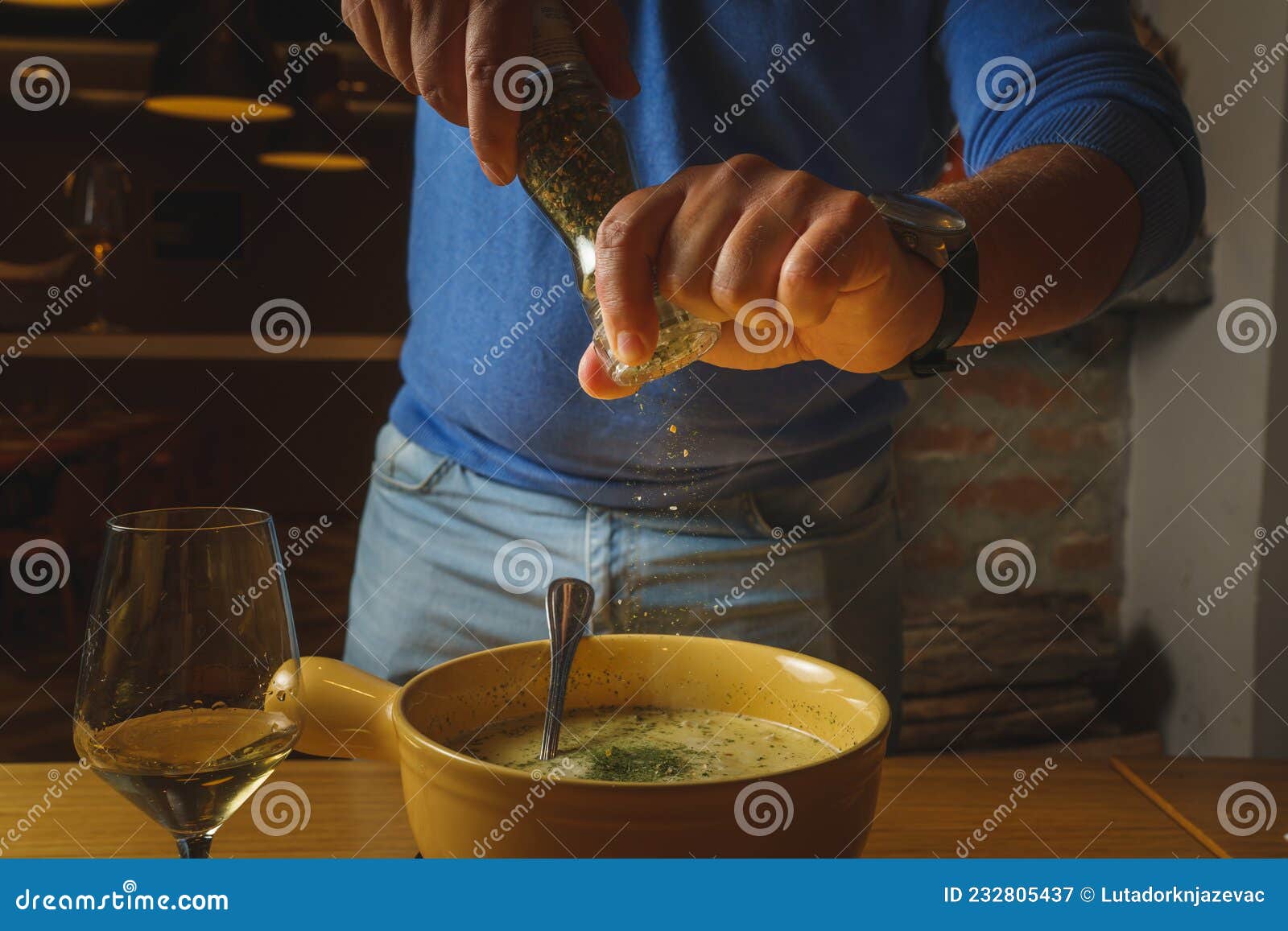 Front View Close Up on Hands of Unknown Man Adding Pepper or Other ...