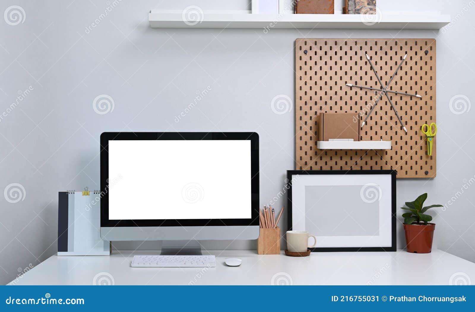 Computer with Blank Screen, House Plant Empty Photo Frame and Office ...