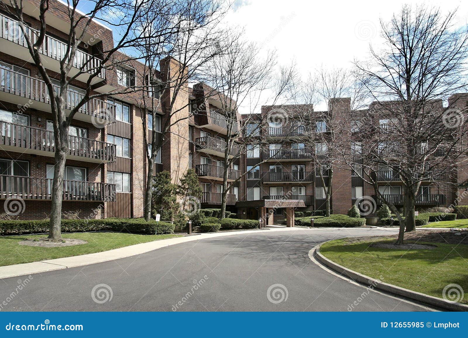Front View of Condominium Complex Stock Image - Image of suburb, garage ...