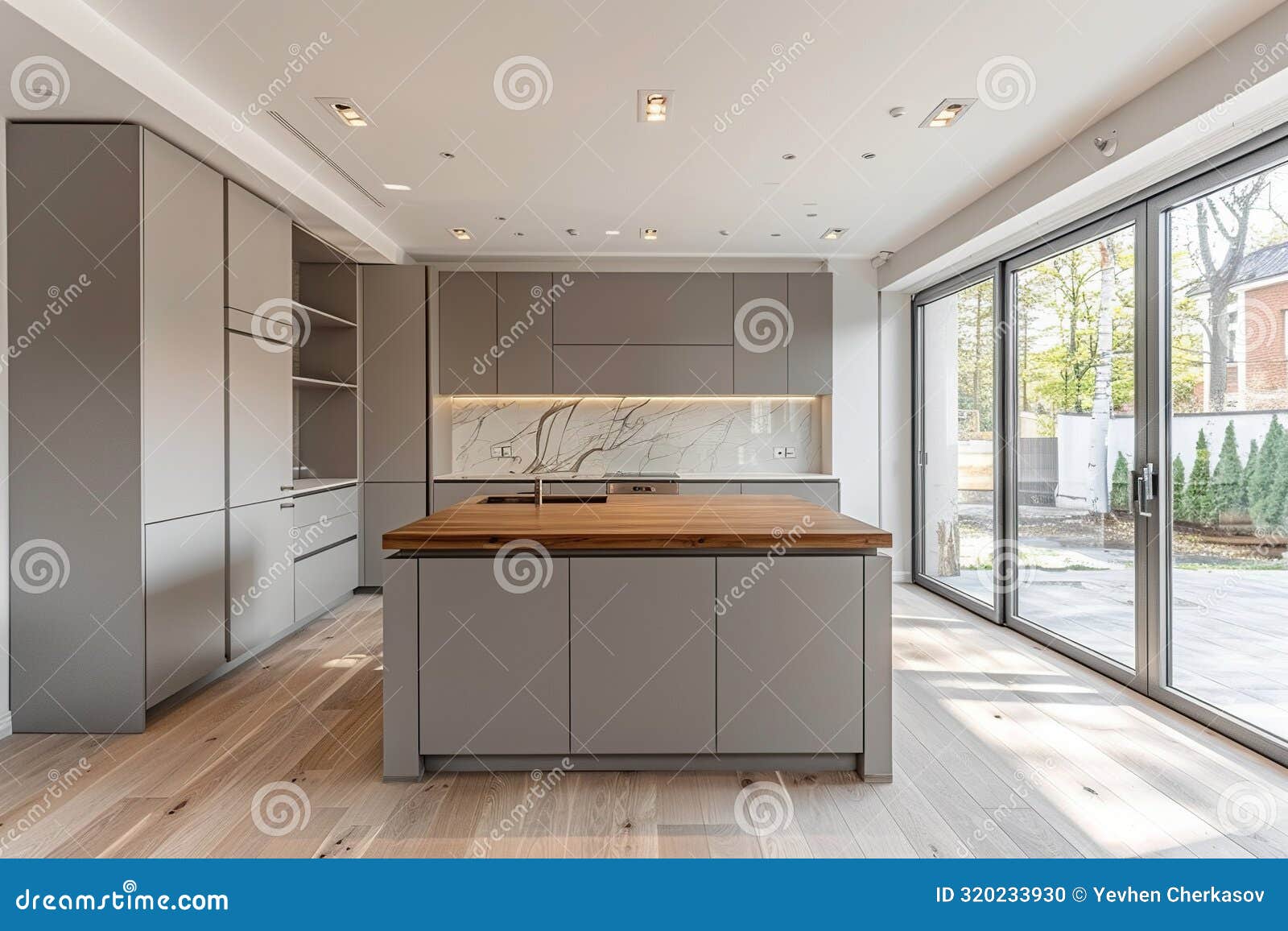 Front View of Elegant Interior with Gray Drawers Under Kitchen Cabinet ...