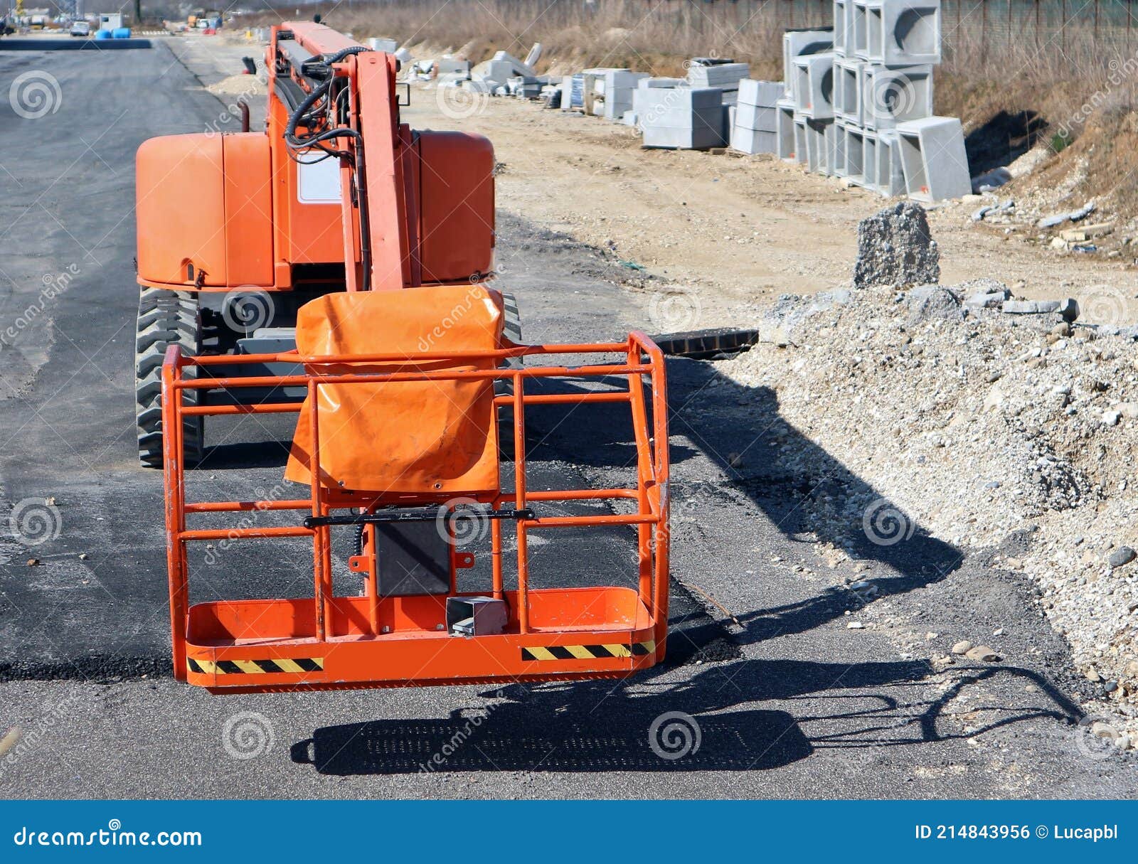Empty Bucket of Cherry Picker Lowered on the Ground. Stock Photo ...