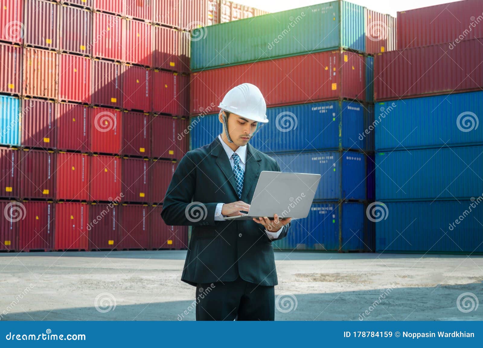 Front View of Engineer Pointing while Working at Shipping Yard Stock ...