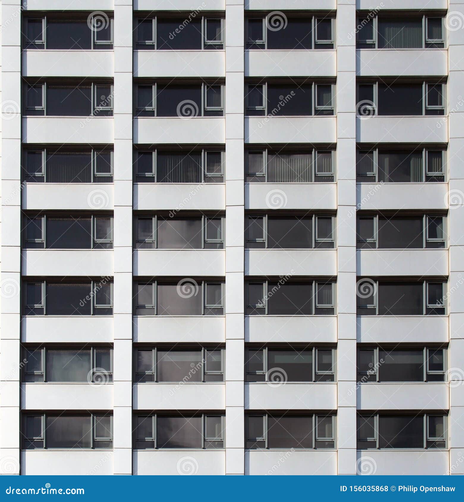 Front View of the Facade of a Modern Commercial Building with Geometric ...