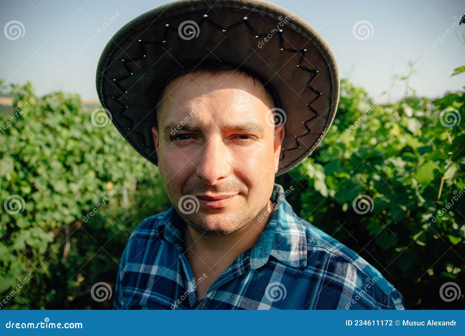 Front View of the Farmer Looking at the Camera and Smiling Stock Photo ...