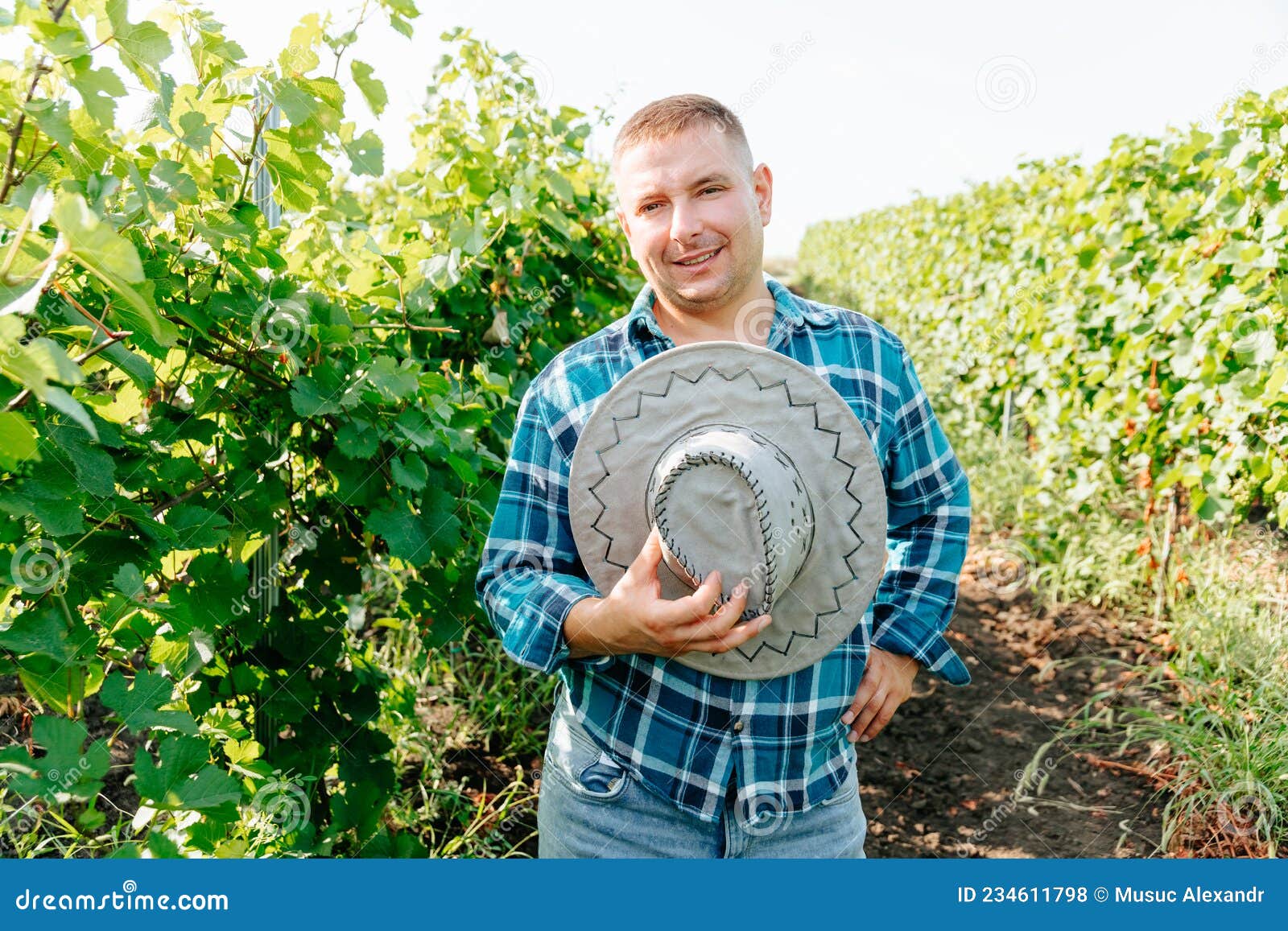 Front View of the Farmer Looking at the Camera and Smiling Stock Photo ...
