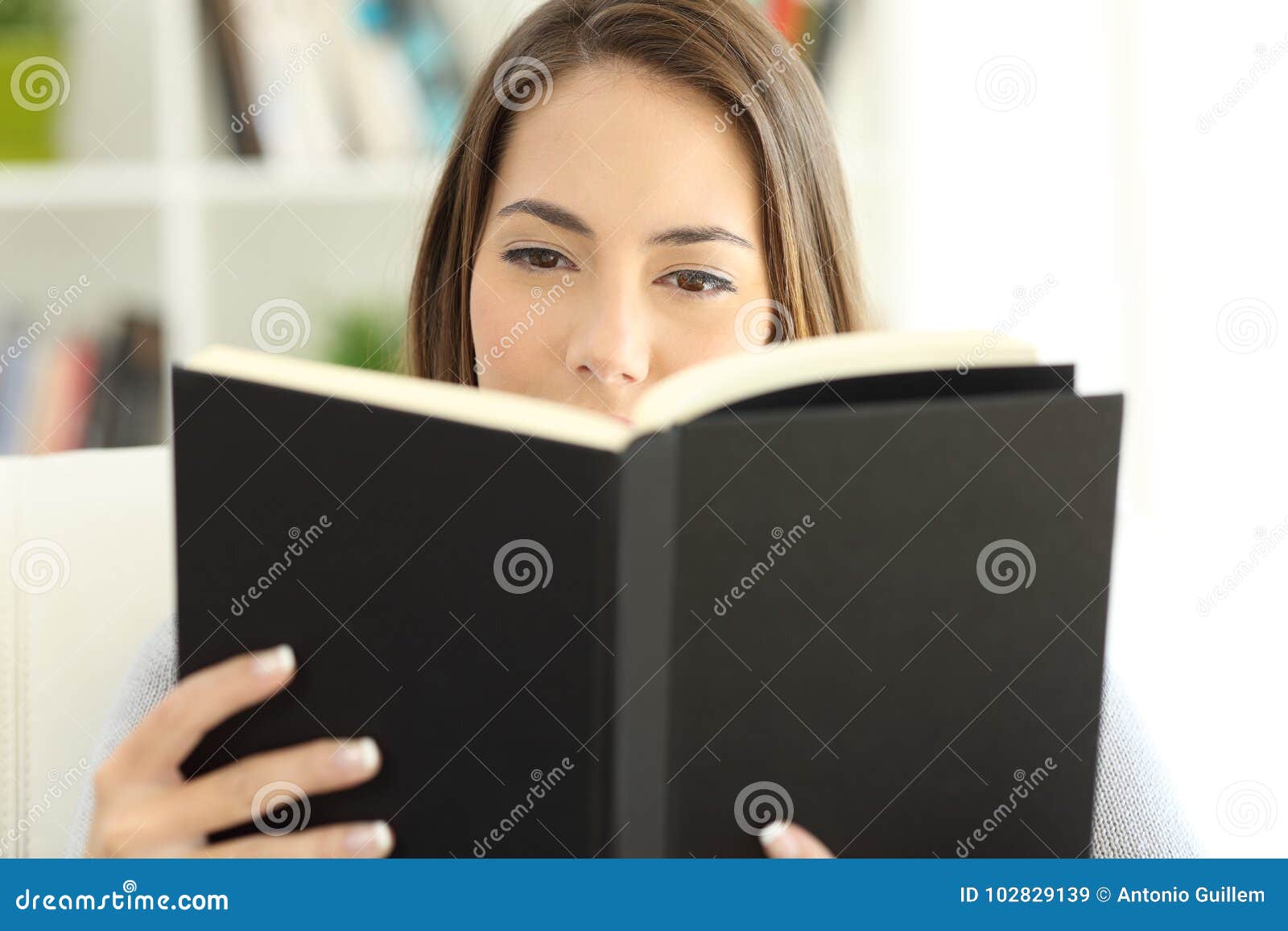 Front View of a Girl Reading a Book at Home Stock Image - Image of lady ...