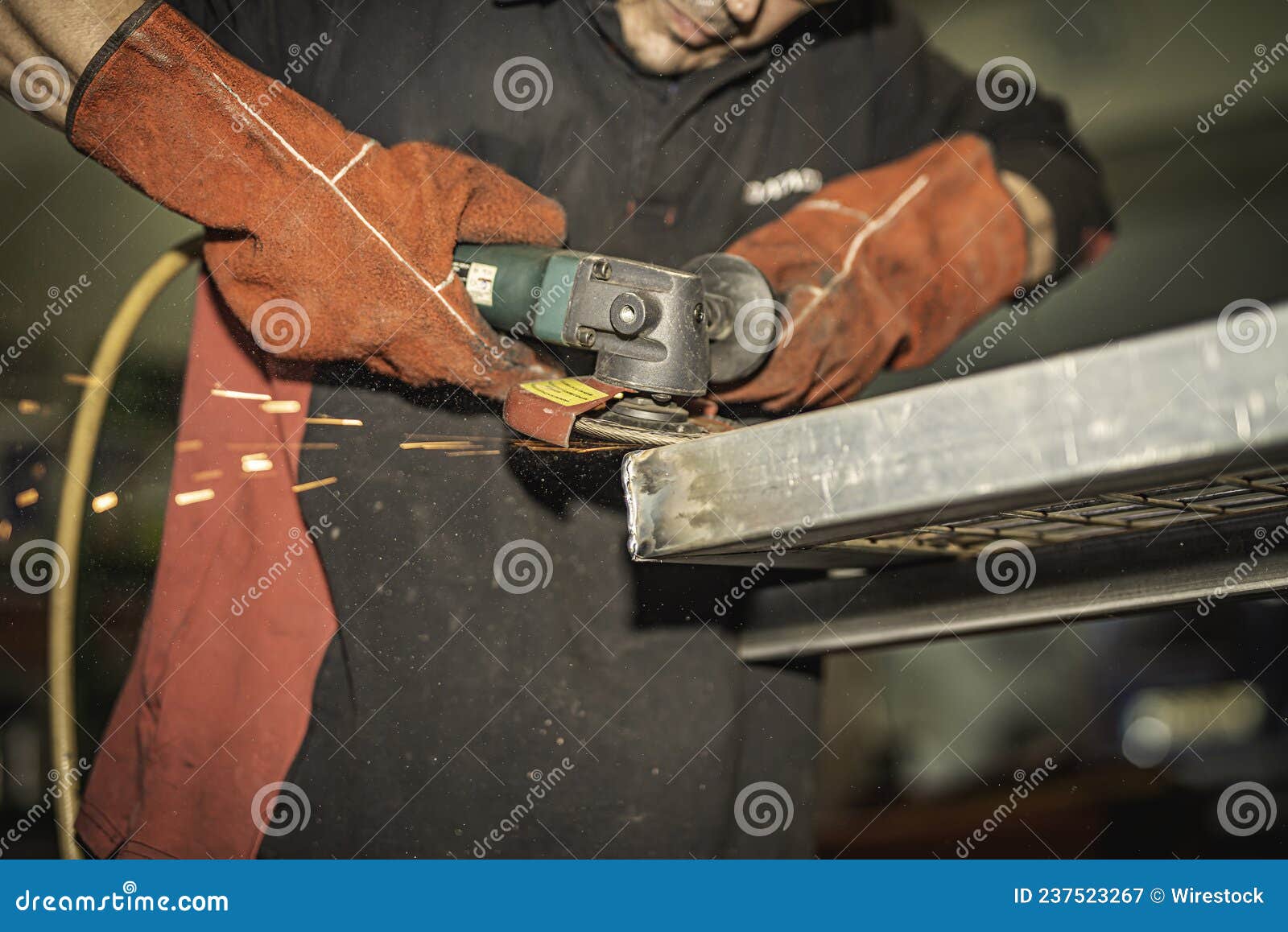 Front View of a Grinder with Grinding Wheel Used by an Unrecognizable ...