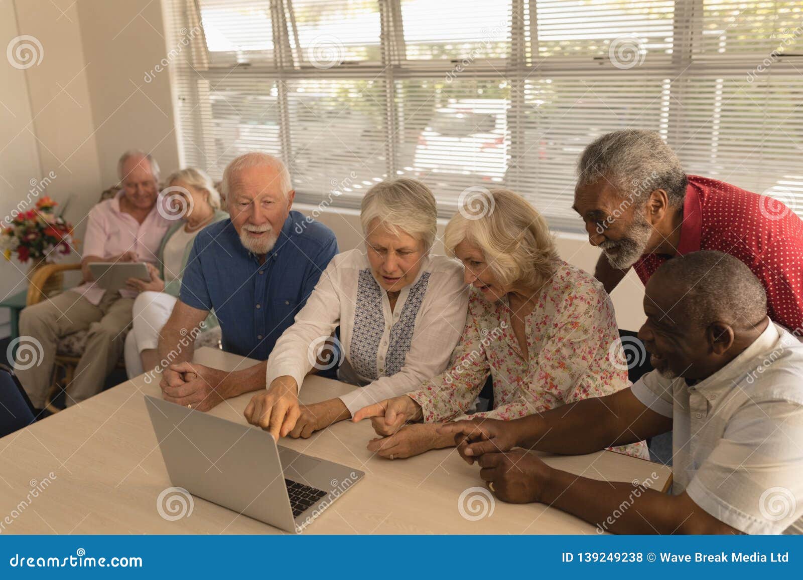 Group of Senior People Using Laptop at Nursing Home Stock Photo - Image ...