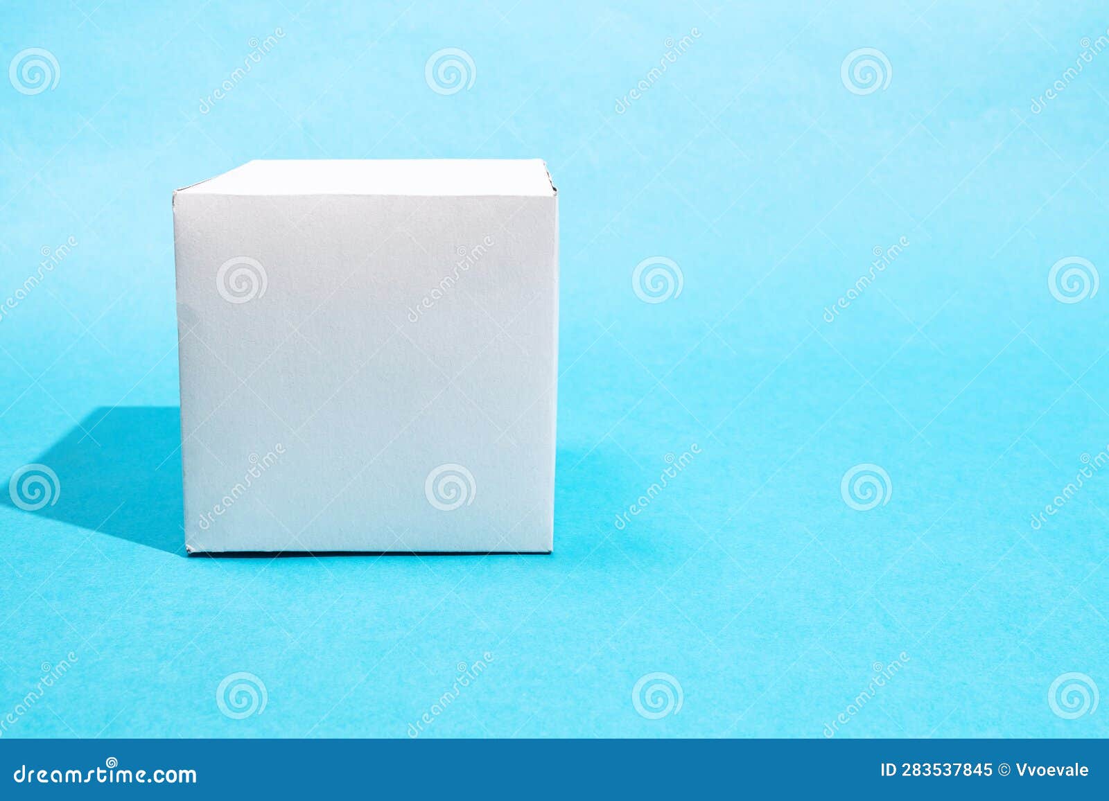 Front View of Hand-crafted Paper Cube on Blue Stock Image - Image of ...