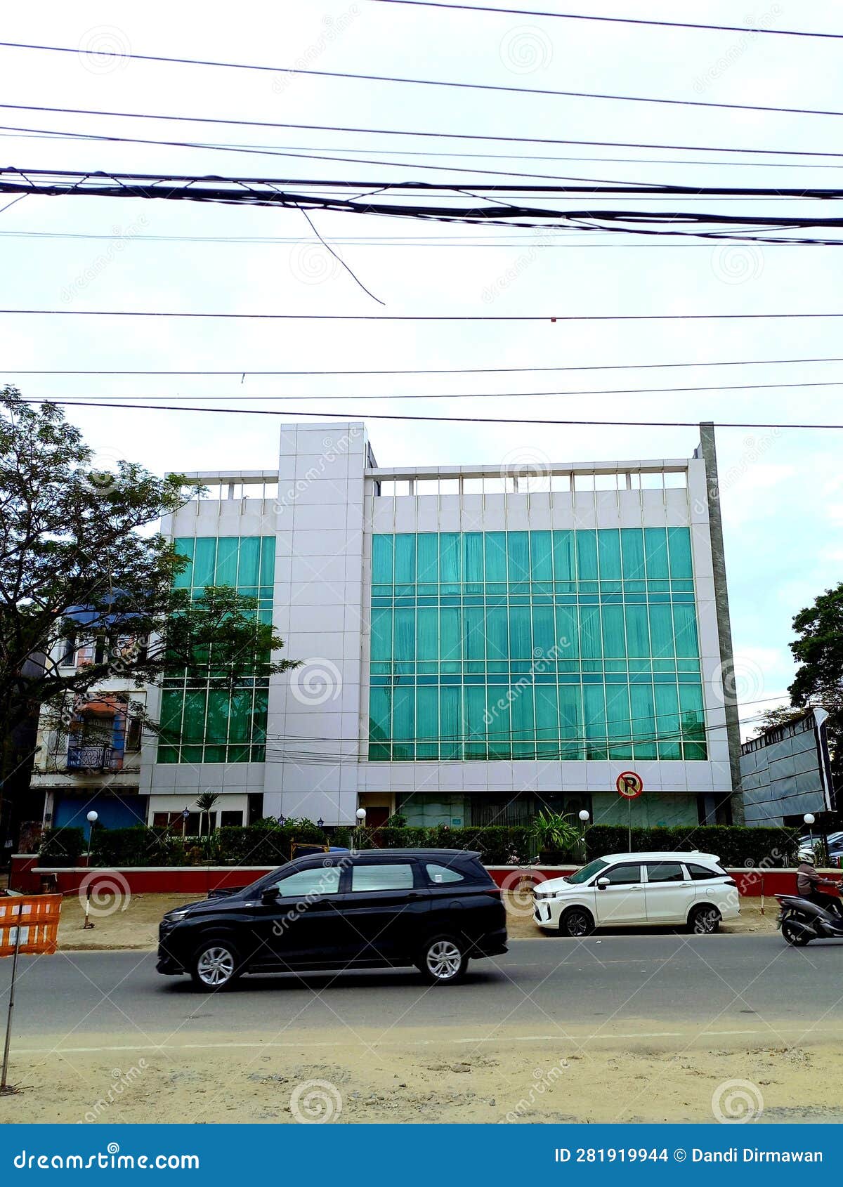 Front View of the Hotel with Green Glass Walls Stock Photo - Image of ...