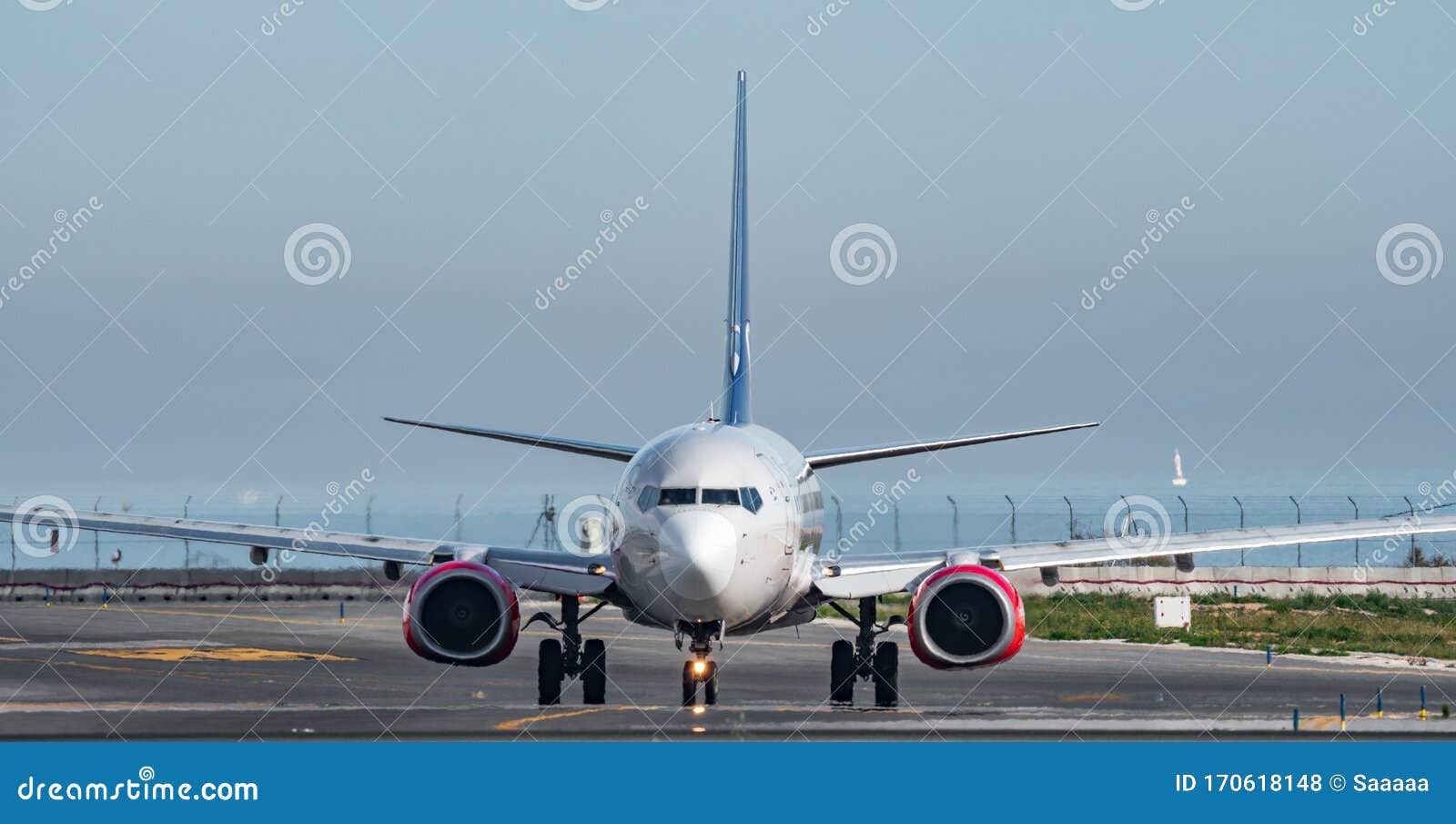 Front View of Jet Plane in the Runway with Text Space Stock Photo ...