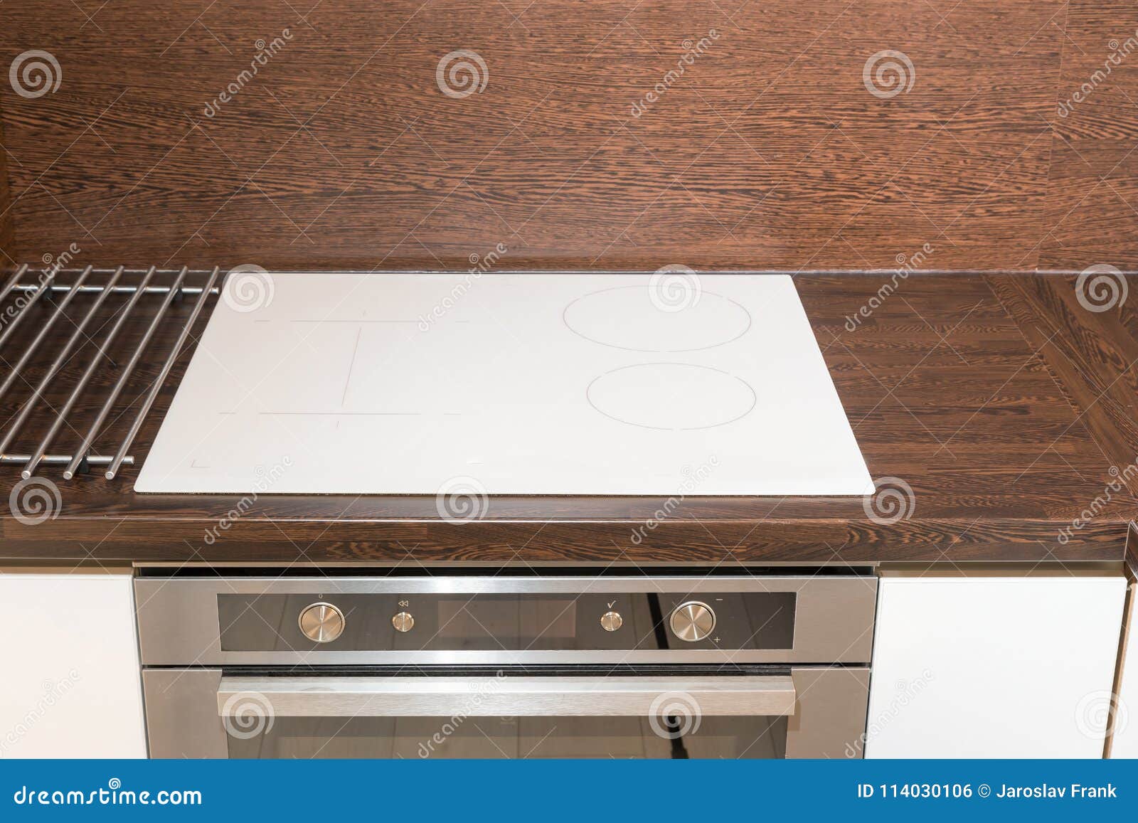 Front View of the Kitchen with a Glass Ceramic Plate and a Stove Stock ...