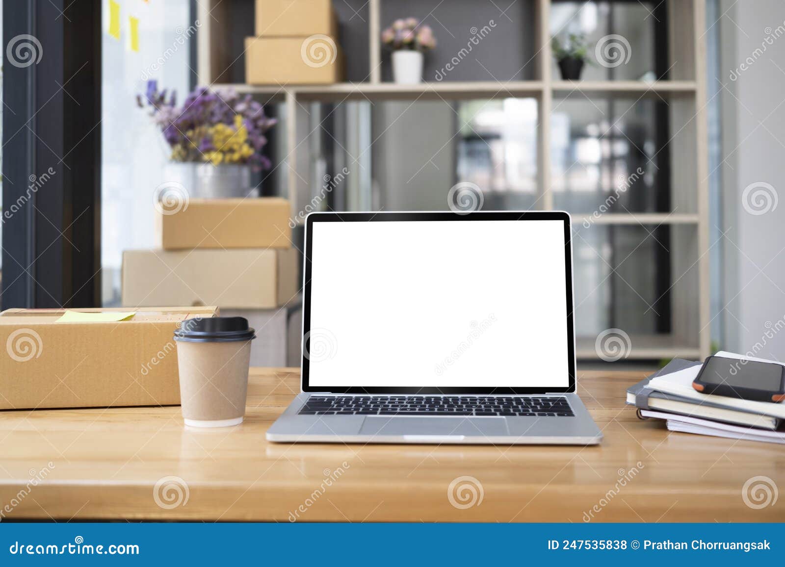 Front View Laptop Computer, Coffee Cup and Cardboard Boxes on Wooden ...