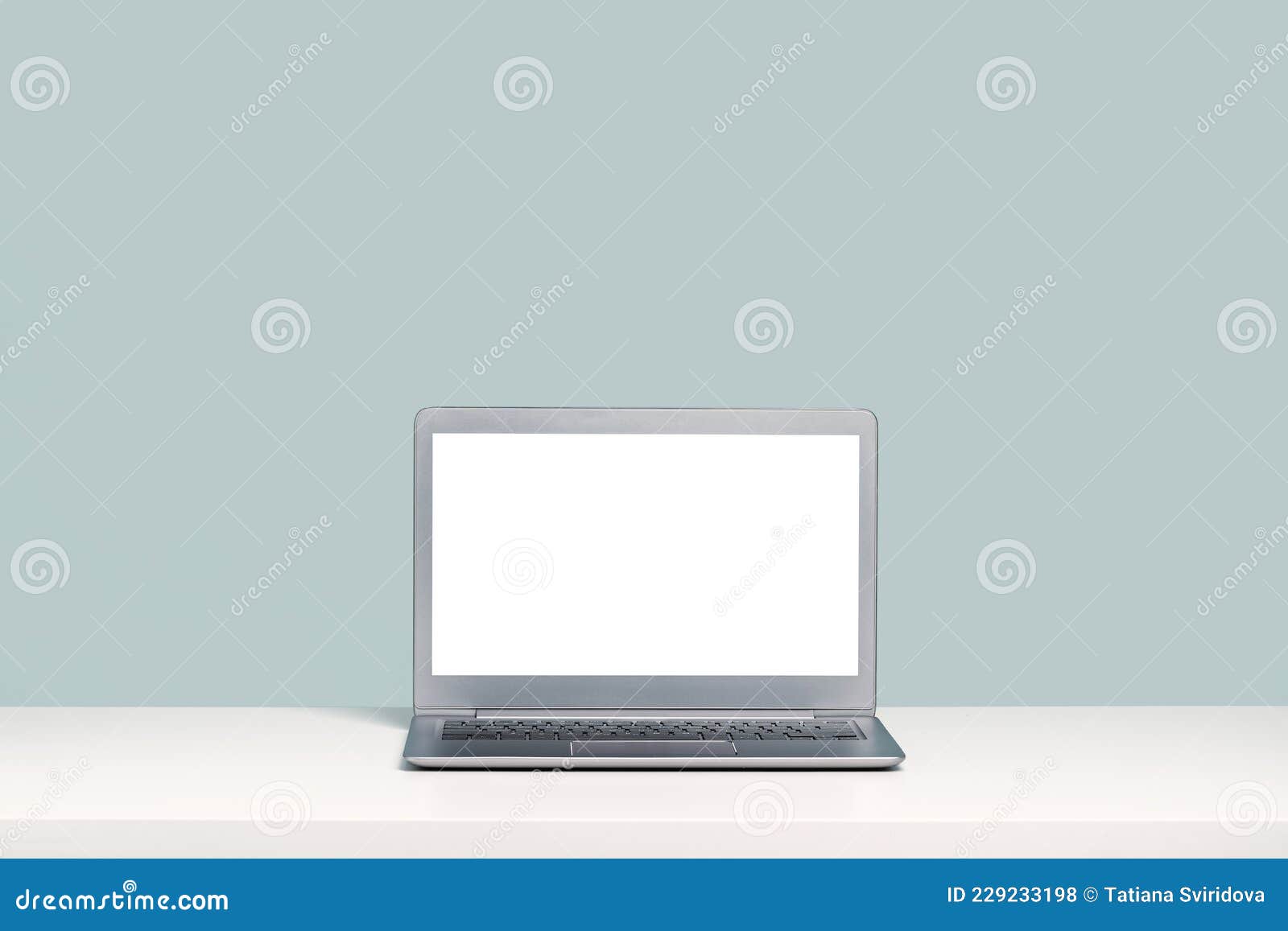 Front View of the Laptop with Mockup Screen on the Desk Stock Photo ...