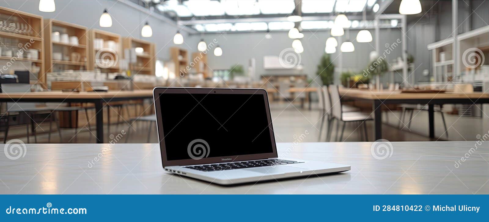 Front View of Laptop with Screen. Modern Architecture in the Background ...