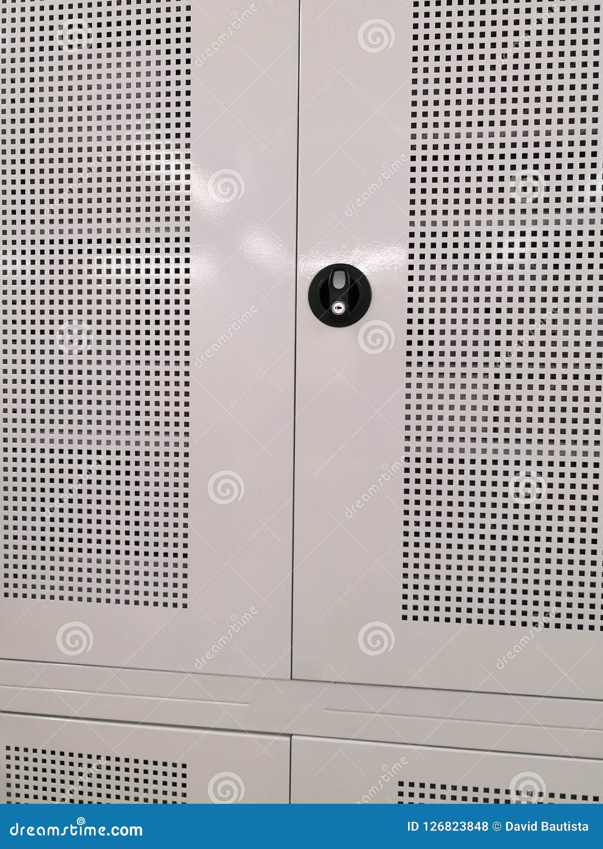 Front View of a Locker with Mesh Grid and a Black Safety Plate Holder ...