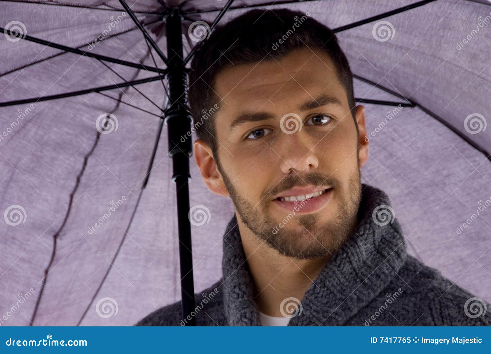 Front View of Man Holding Umbrella Stock Image - Image of hispanic ...