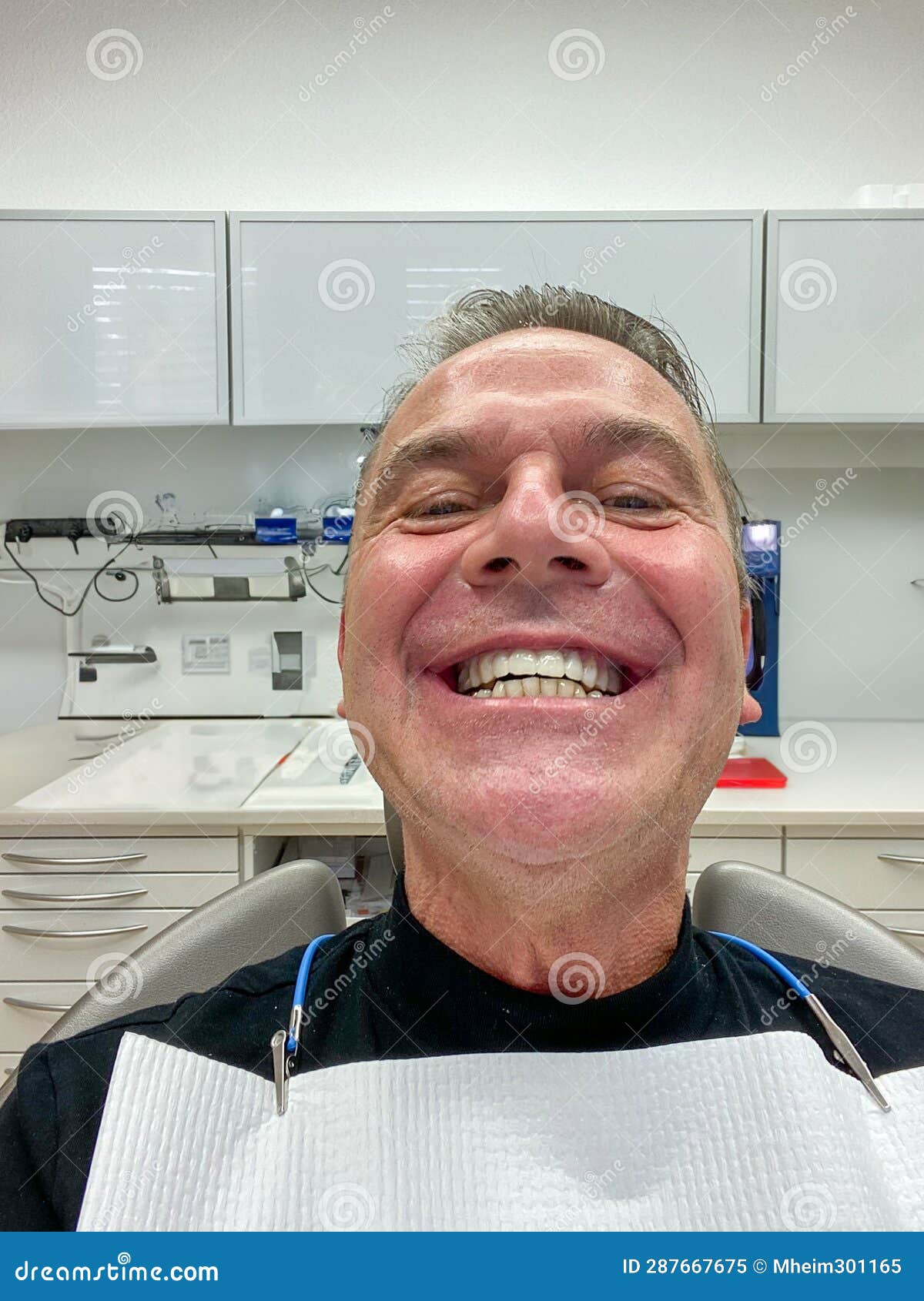 Front View of a Man Showing His New Teeth Stock Image - Image of black ...