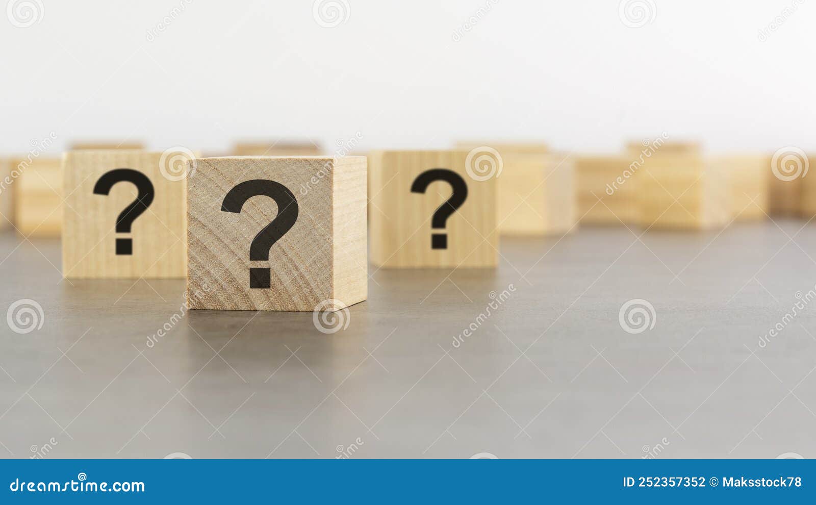Front View on Many Wood Cubes with Question Marks. Many Question ...