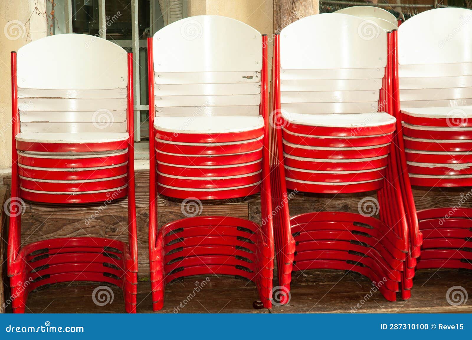 Four Stacks of Red and White, Plastic and Metal, Restaurant Chairs ...