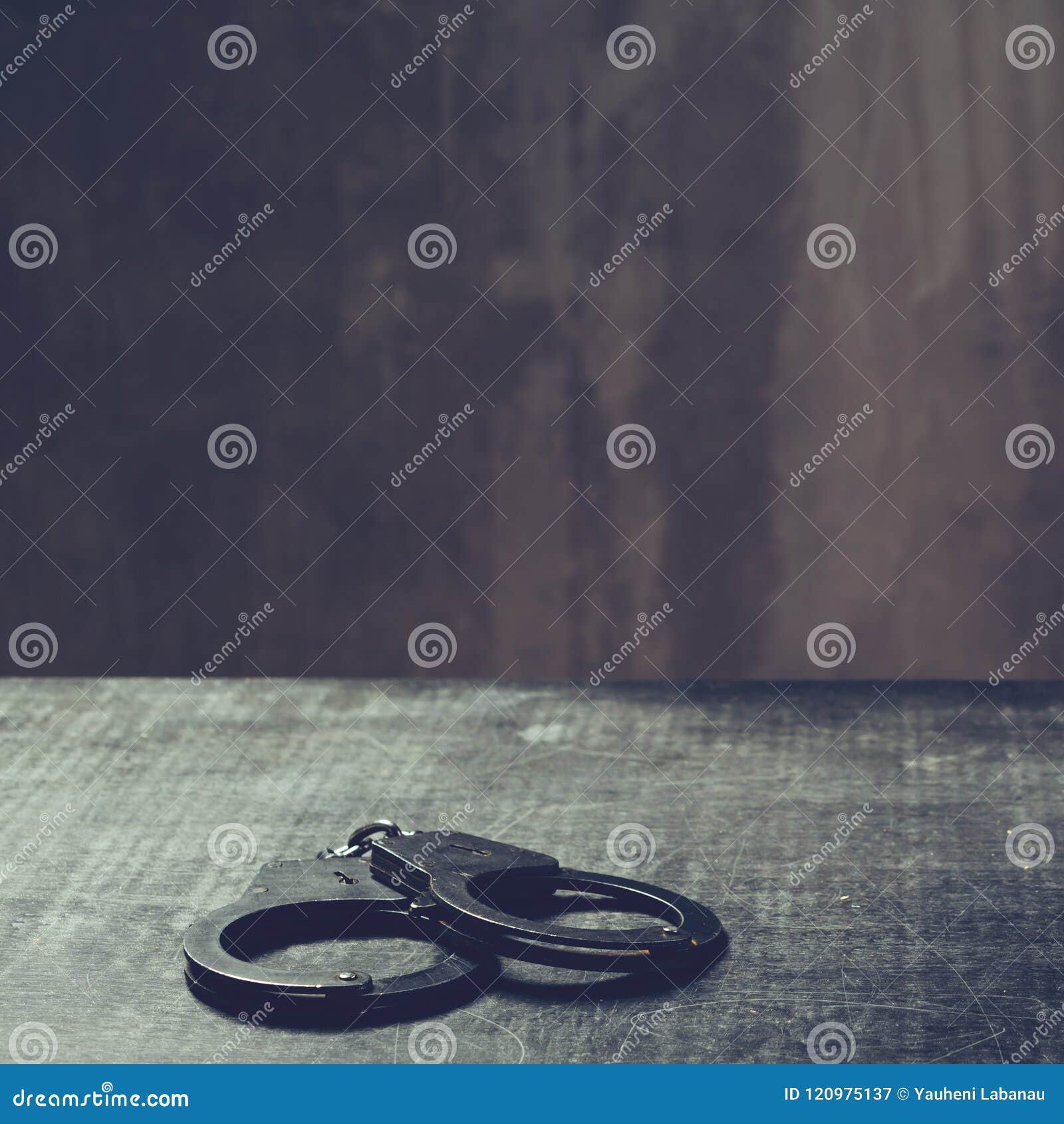 Front View of Metal Handcuffs on Table in the Interrogation Room Stock ...