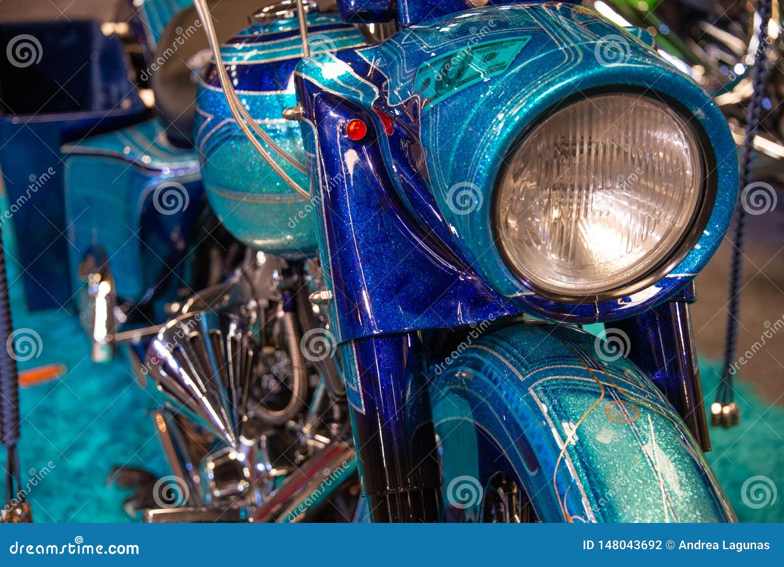 Front View of Metallic Blue Motorcycle with Silver Flashes and Chromed ...