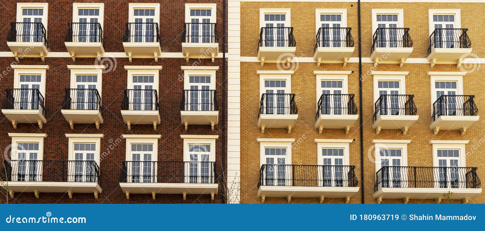 Front View of a Modern Residential Brown Brick Building with Balconies ...