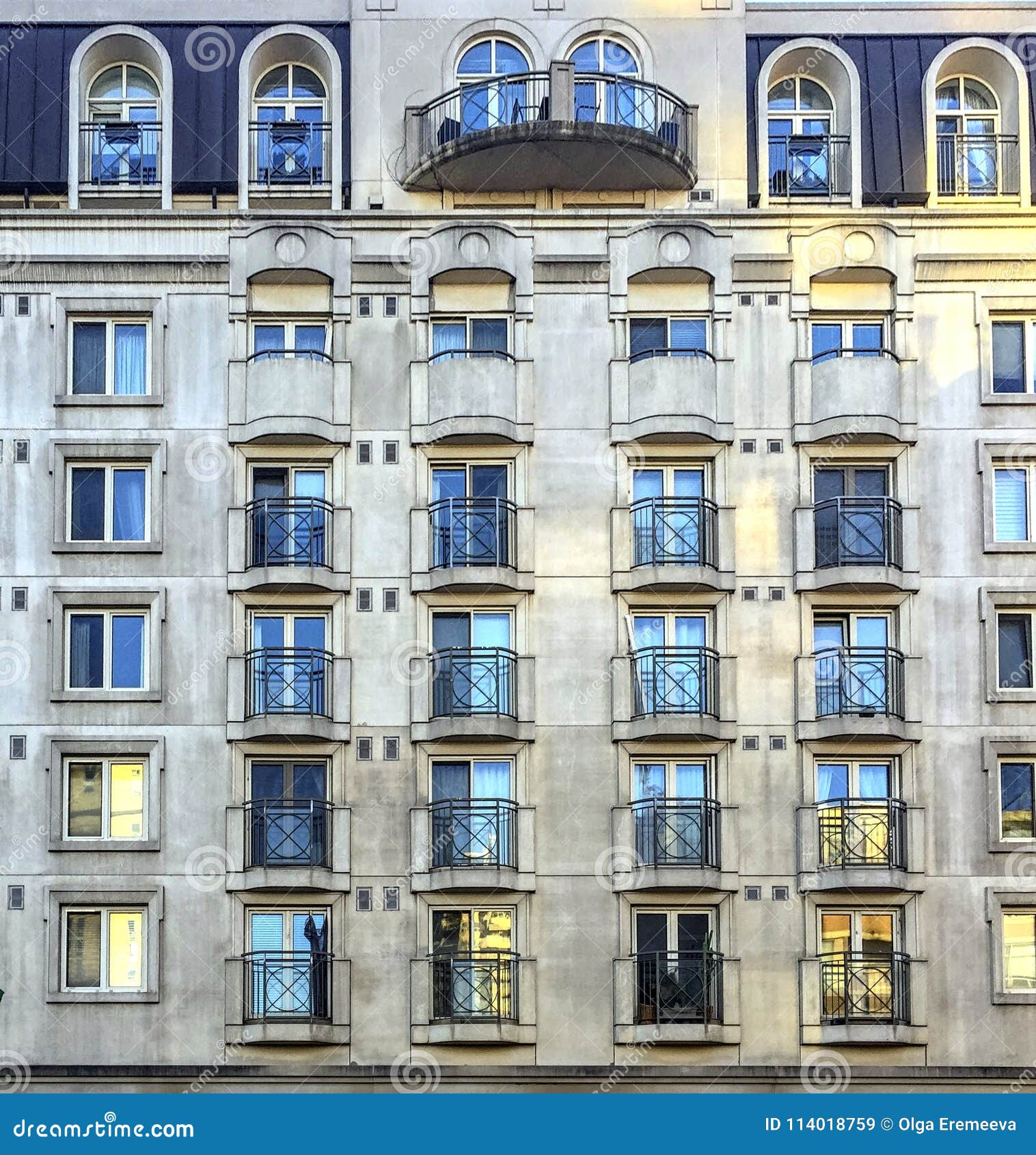 Front View of Modern Residential Building with Many Sunlit Windows ...