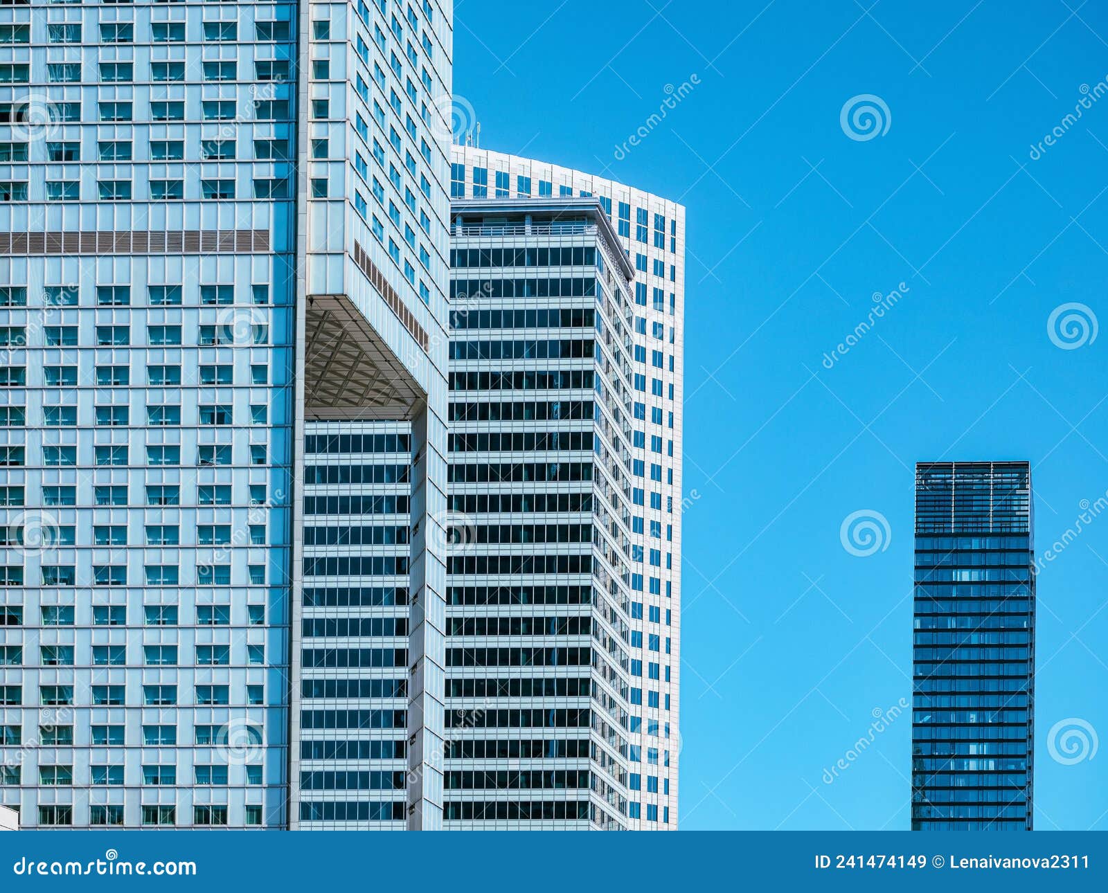 Front View on Modern White Skyscrapers Over Blue Sky Background Stock ...
