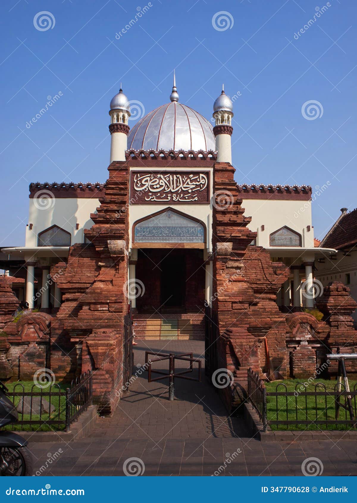 The Front View of Mosque Which Has Arabic Calligraphy that Informs Its ...