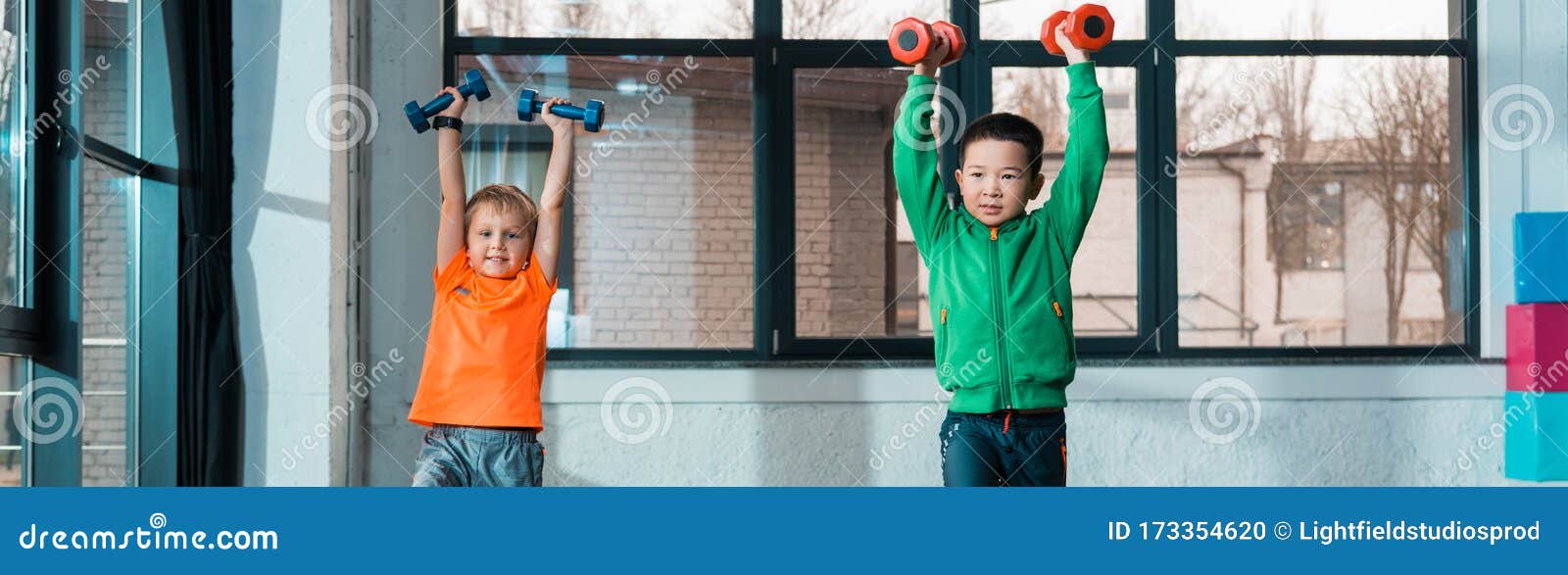 Front View of Multicultural Kids Raising Stock Photo - Image of ...