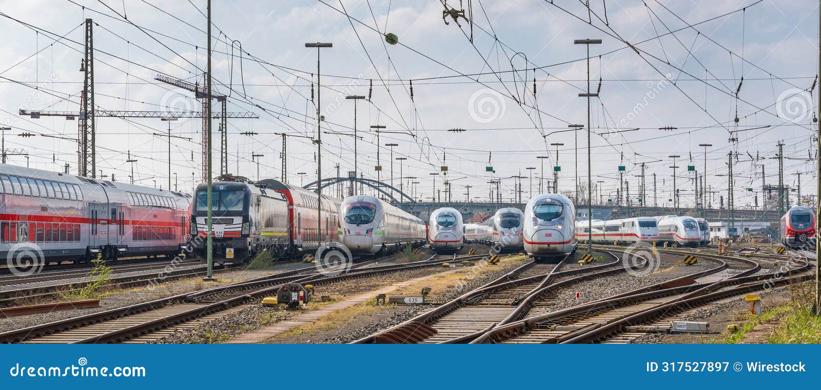 Front View of Multiple Trains Standing on the Train Tracks Editorial ...