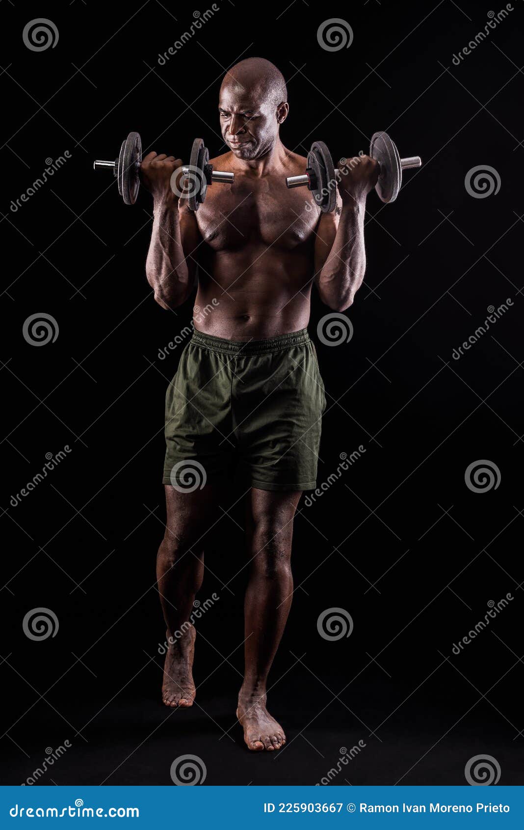 Front View of a Muscular Man Standing Doing Exercise for Biceps Stock ...