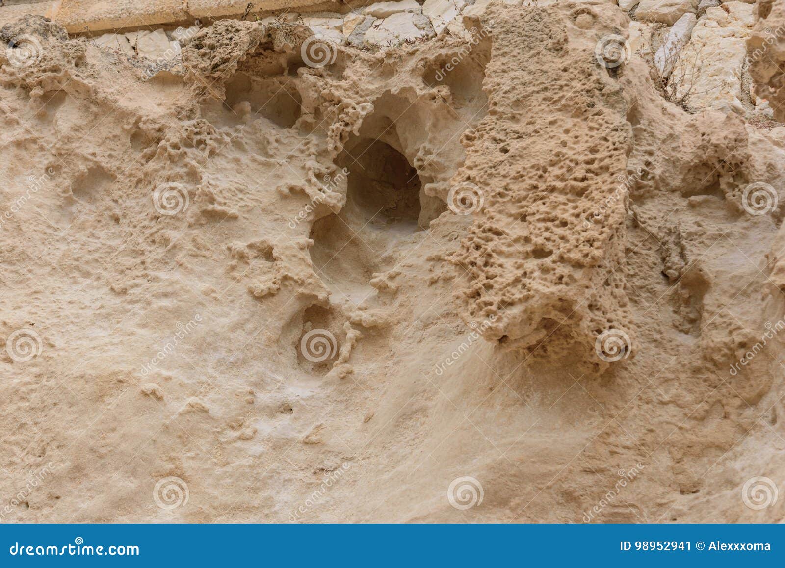 Front View of the Natural Background of Yellow Limestone with the Bumpy ...