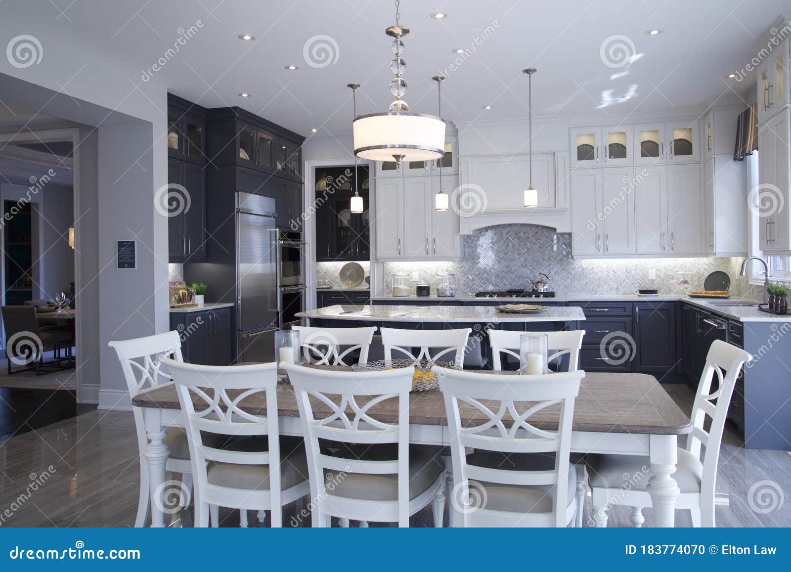 Front View of a Newly Designed Kitchen and a Dinning Table Inside a ...