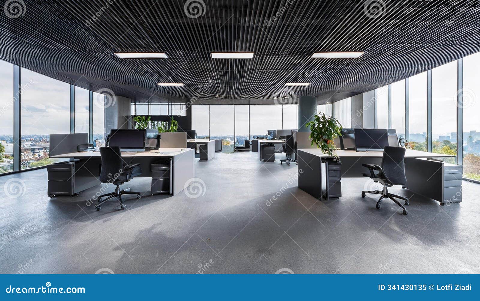 Front View of an Open Office Interior with Desks, Computers, a Concrete ...