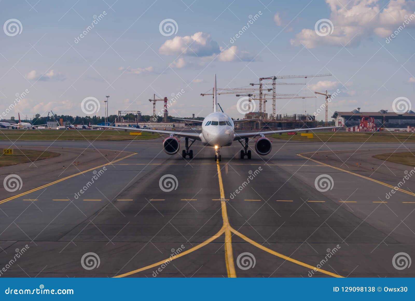 Front View of a Passenger Plane on the Airport Runway Stock Photo ...