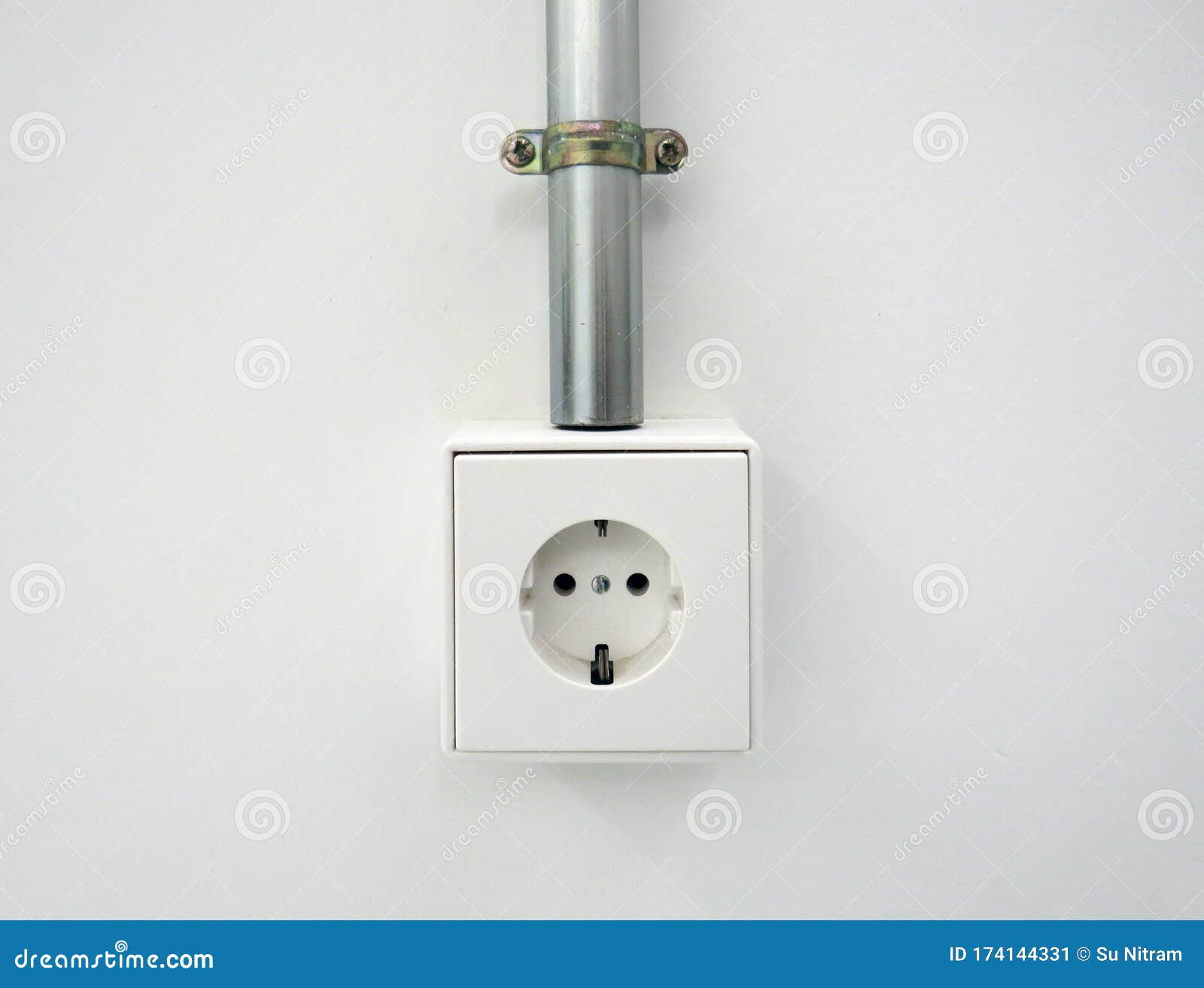 Front View of Plug on White Wall and Metal Tube. Industrial and Modern ...