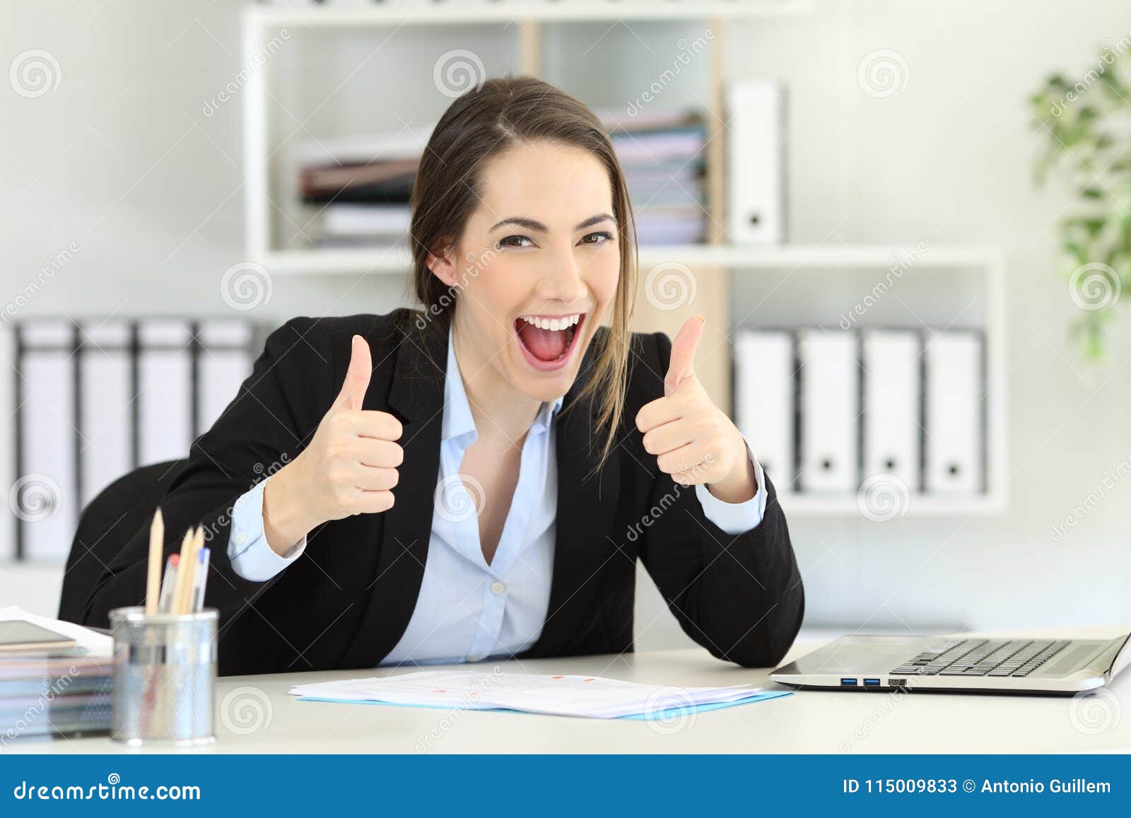 Excited Executive Looking at Camera with Thumbs Up Stock Image - Image ...