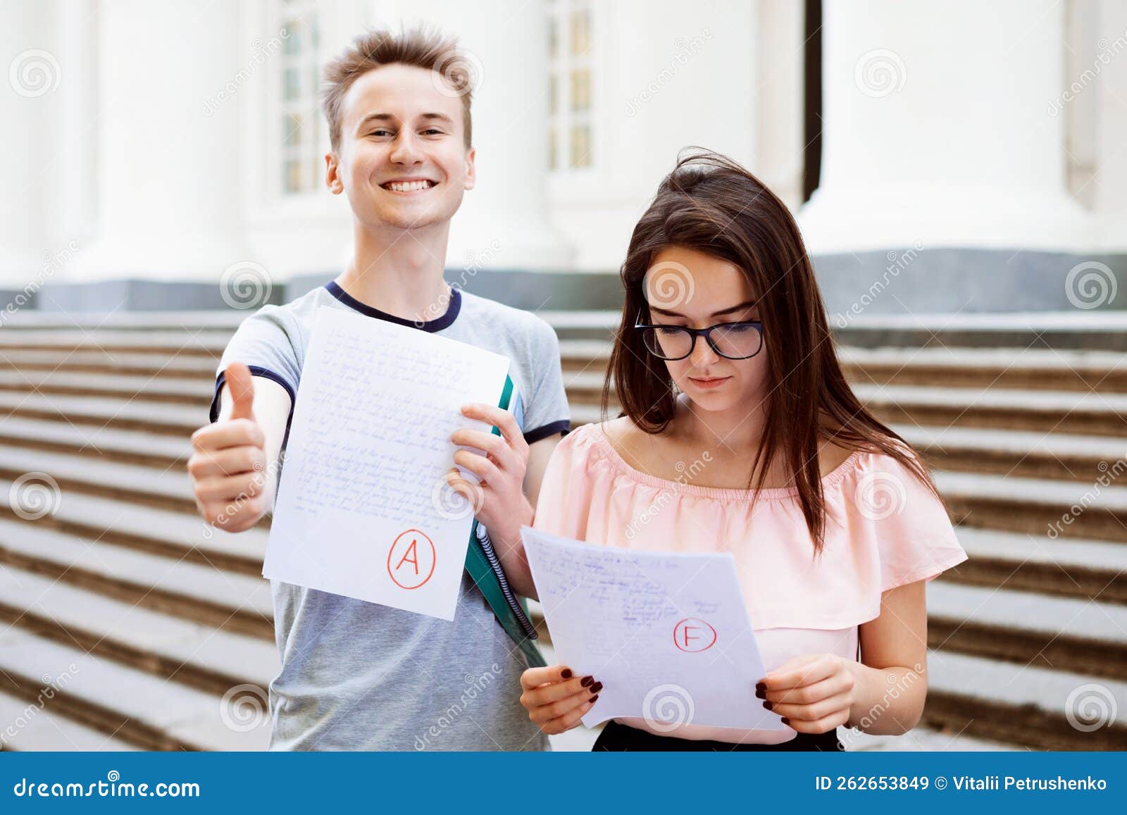 Portrait of Two Students Showing Failed and Approved Exams Stock Image ...