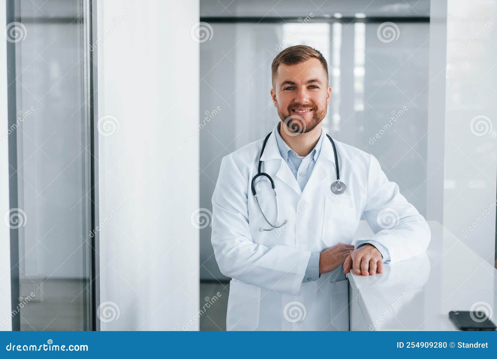 Front View. Professional Medic in White Coat is in the Clinic Stock ...