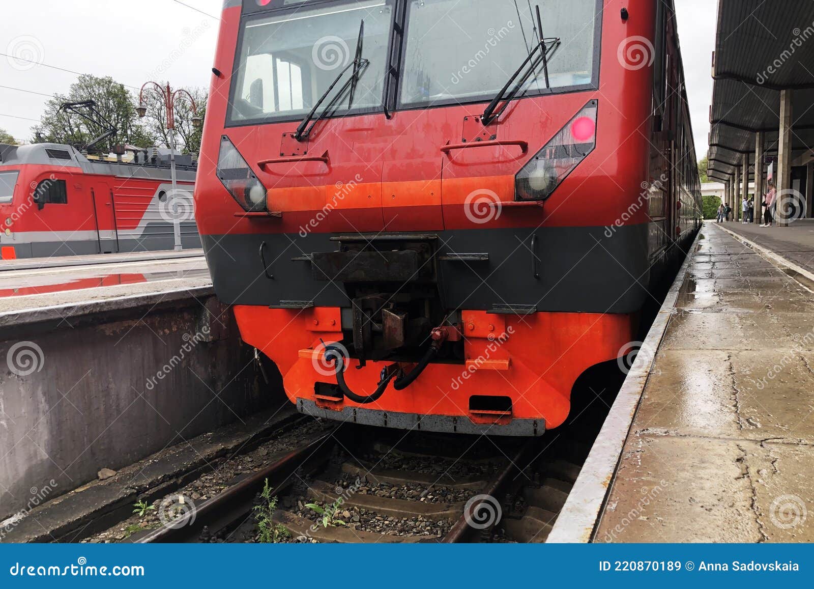 Front View of Red Train Standing on Platform on Railway Station Ready ...