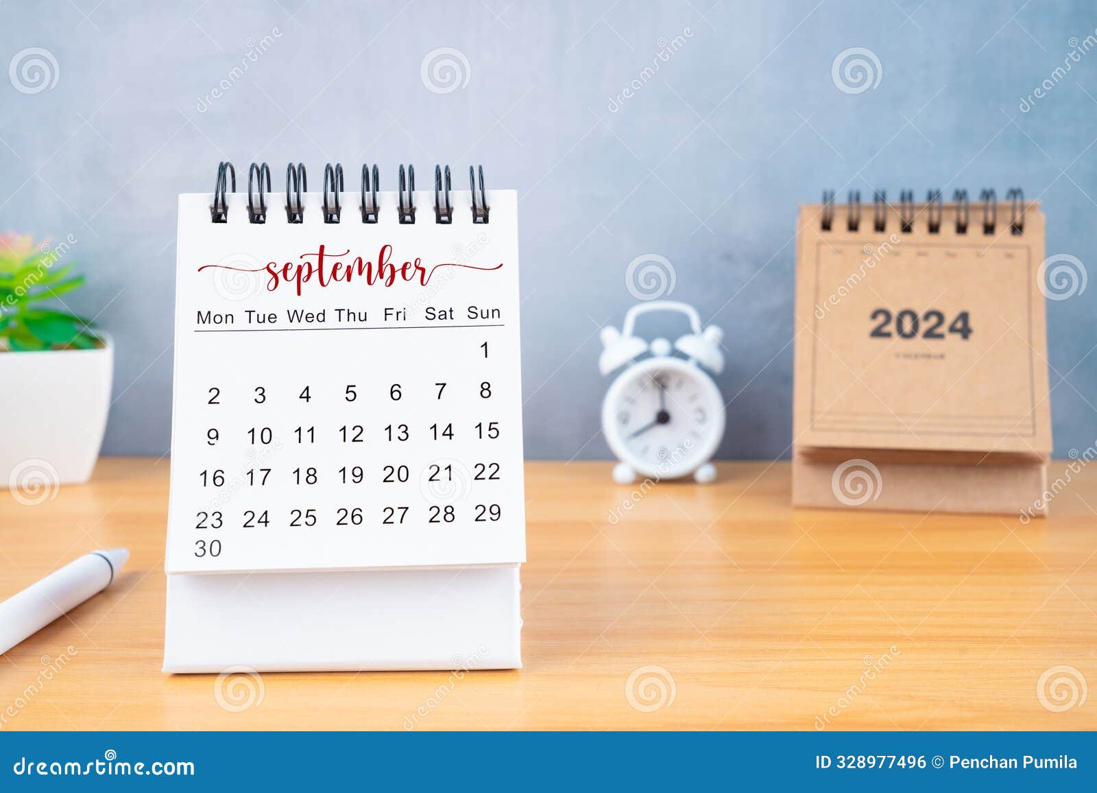 Front View of September Desk Calendar for 2024 Year and Alarm Clock ...