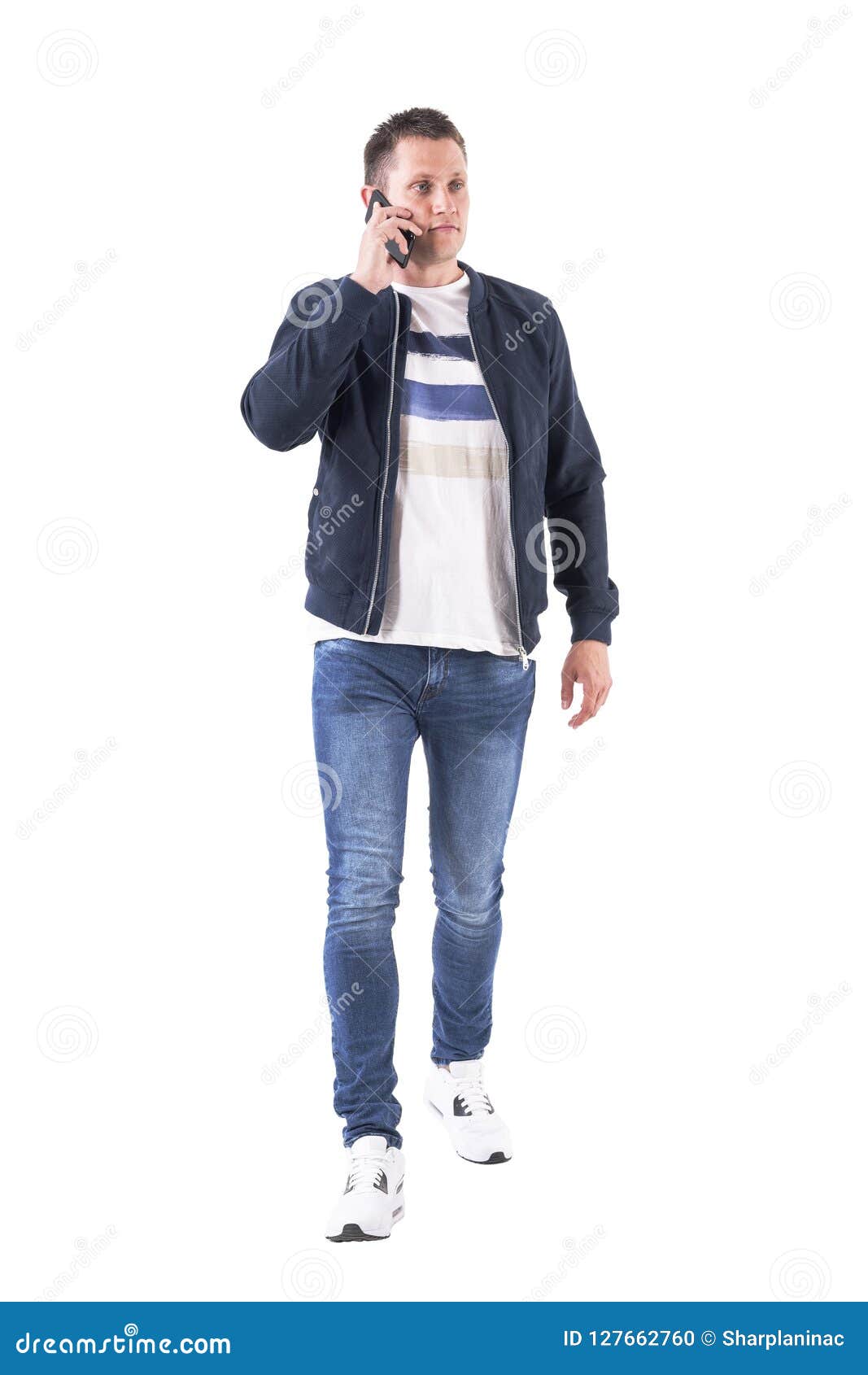 Front View of Serious Confident Man Talking on the Phone Walking ... Front View of Serious Confident Man Talking on the Phone Walking ...