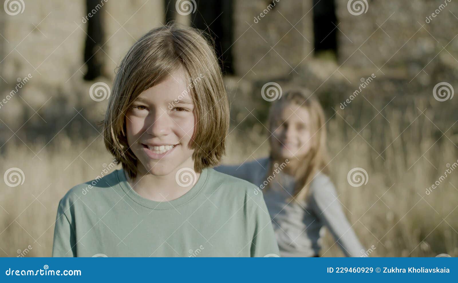 Front View of Smiling Boy Standing and Looking at Camera Stock Video ...