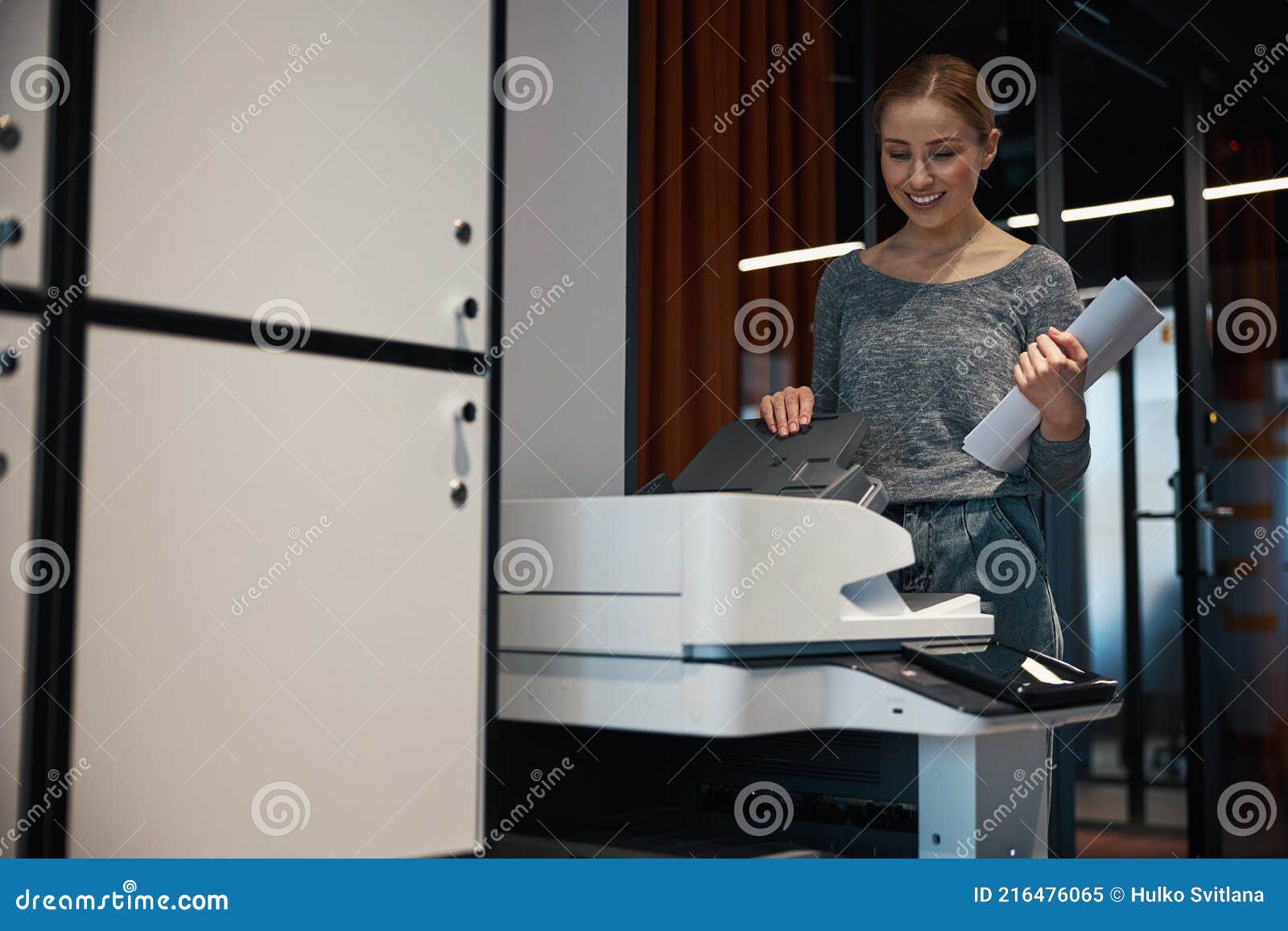 Cheerful Office Assistant Preparing Papers for Printing Stock Image ...