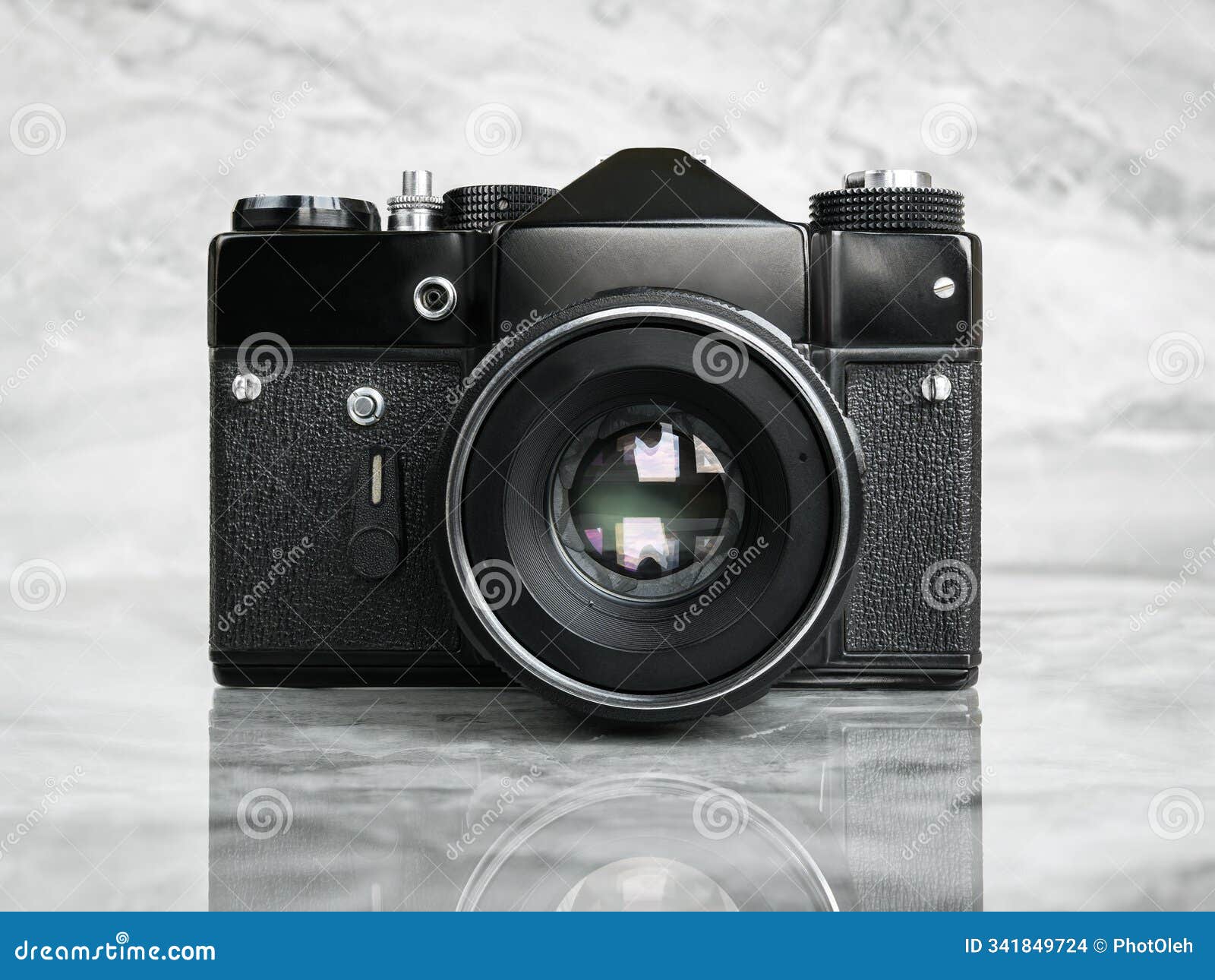Front View of a Soviet Black Film Camera on a Polished Marble Surface ...