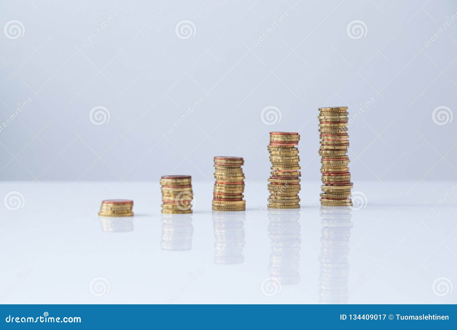Ascending stacks of coins stock image. Image of investment - 134409017