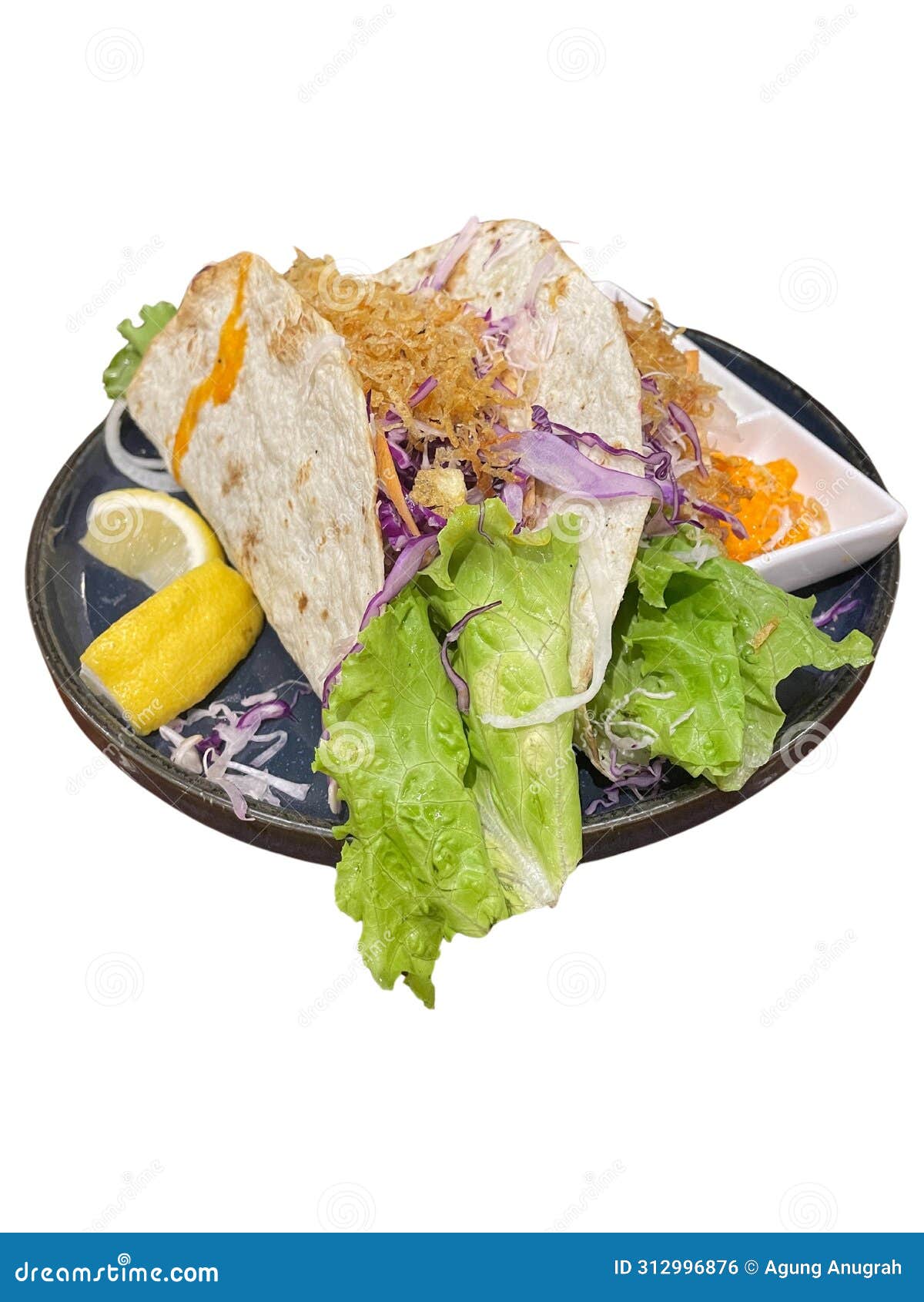 Front View of Tacos on Plates with Beef, Lettuce, Tomatoes, Cheese ...