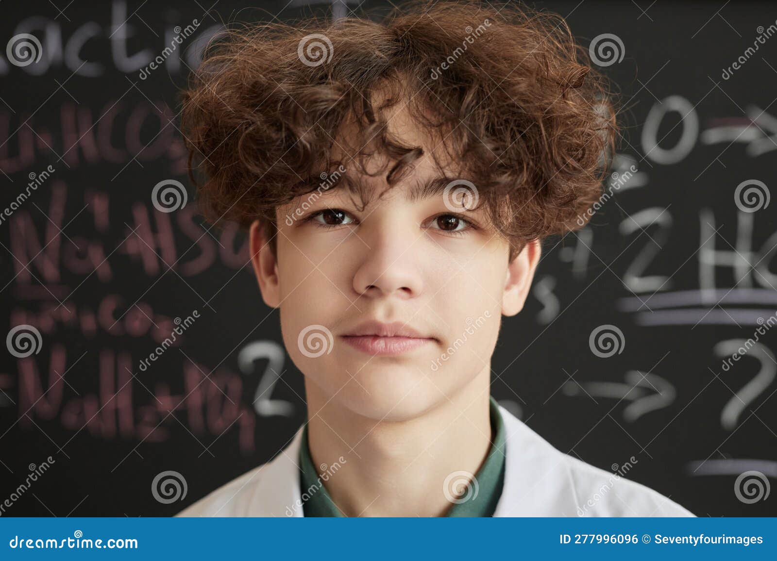 Front View Teenage Boy Wearing Lab Coat in Science Class Looking at ...
